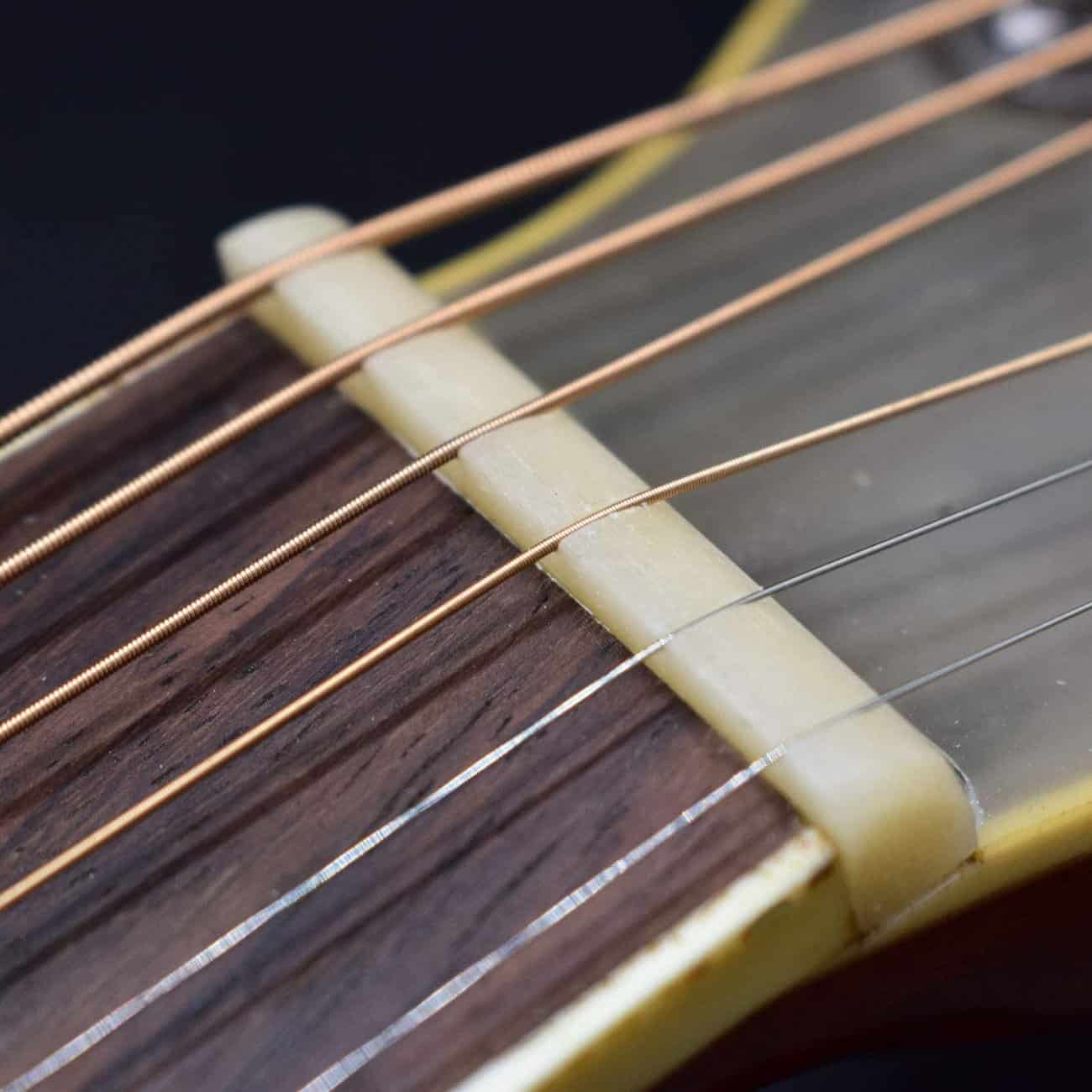 5 Ways to Make Your Acoustic Guitar Sound Better - Guitar Pick Reviews