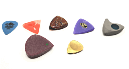 How to Hold a Guitar Pick? 7 Options - Guitar Pick Reviews